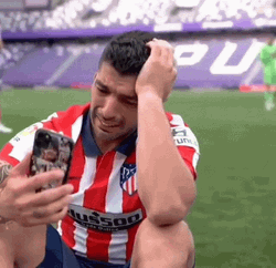 Luis Suarez Crying Over Phone GIF | GIFDB.com