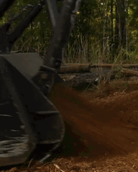 Machine Ejecting Mulch Slow Motion GIF | GIFDB.com