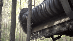 Machine Producing Mulch From Tree Close View GIF | GIFDB.com