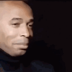 Man Holding In Laugh Shaking Lips GIF | GIFDB.com