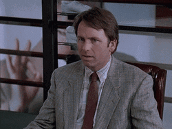 Man In Suit Head Scratch GIF | GIFDB.com