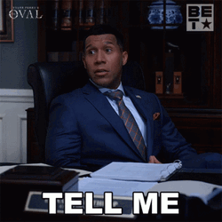 Man In Suit Says Tell Me GIF | GIFDB.com
