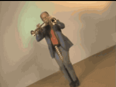 Man Jumping Trumpet GIF | GIFDB.com