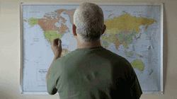 Man Pinning Travel Map GIF | GIFDB.com