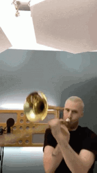 Man Playing Sad Trombone GIF | GIFDB.com
