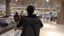 Man Running Inside Airport GIF | GIFDB.com