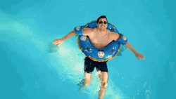Man Swimming With Floaties GIF | GIFDB.com