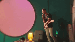 Man Thinking Hmmmm During Photoshoot GIF | GIFDB.com