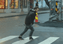 Man Walking Against Wind GIF | GIFDB.com