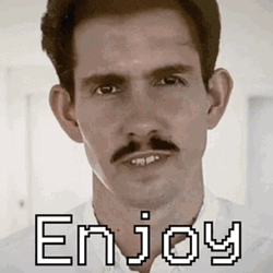 Man With Moustache Saying Enjoy GIF | GIFDB.com