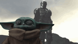 Mandalorian Punt Kick Grogu GIF | GIFDB.com