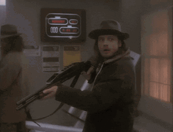 Maybe Not Cocky Cowboy Yielding Gun GIF | GIFDB.com