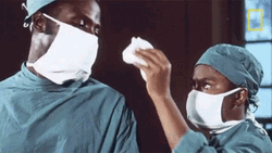 Médica Surgical Assistant Wiping Sweat On Surgeon GIF | GIFDB.com