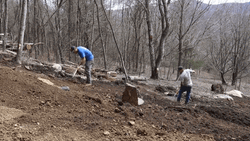 Men Evening Out Mulch On The Ground GIF | GIFDB.com