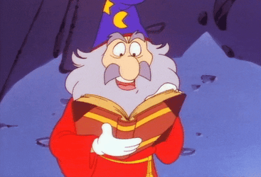 Merlin Reading Magic Spells GIF | GIFDB.com