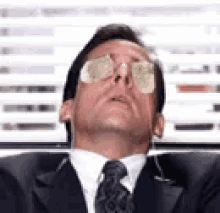 Michael Scott The Office Tea Bags On Eyes GIF | GIFDB.com