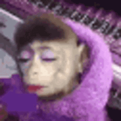 Monkey With Make Up And Long Eyelashes GIF | GIFDB.com