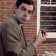Mr. Bean Sad Expression GIF | GIFDB.com