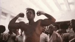 Muhammad Ali Flexing Muscles GIF | GIFDB.com