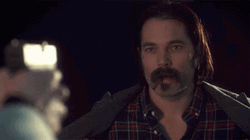 Mustached Guy Doc Holliday Smoking Tobacco GIF | GIFDB.com