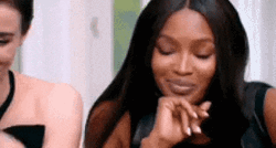 Naomi Campbell Tries Holding Back To Laugh GIF | GIFDB.com