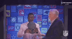 Nfl Draft Happy Player Wearing Cap GIF | GIFDB.com