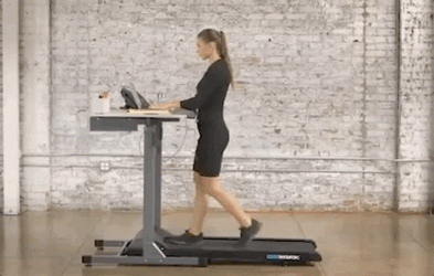 Office Girl Walking On Treadmill GIF | GIFDB.com