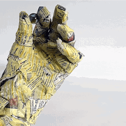 Paper Mache Hand Holding Marble GIF | GIFDB.com
