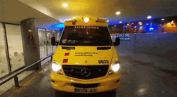 Paramedics Popping In Front Of An Ambulance GIF | GIFDB.com