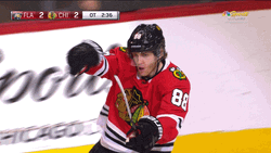 Patrick Kane Greeted With Hug GIF | GIFDB.com