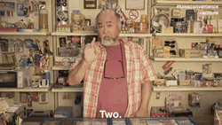 Paul Sun Hyung Lee Showing Two Fingers GIF | GIFDB.com