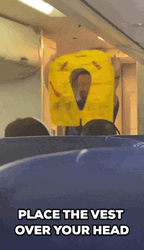 Place The Vest Over Your Head GIF | GIFDB.com