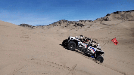 Polaris Curtis Buggy Catching Air Over Sand Dune GIF | GIFDB.com