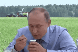 President Vladimir Putin Happily Eating Ice Cream GIF | GIFDB.com