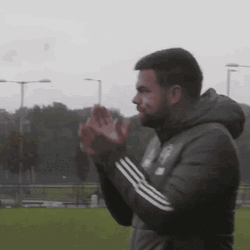 Proud Coach Clapping Football Field GIF | GIFDB.com