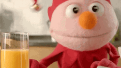 Puppet Shaking Drinking Orange Juice GIF | GIFDB.com