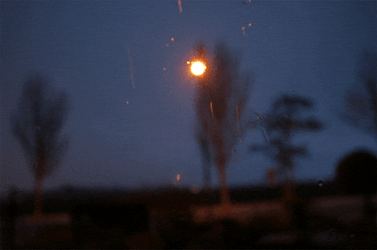 Rainy Night Flashlight GIF | GIFDB.com