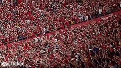 Red Fans Tomahawk Chop Simultaneously GIF | GIFDB.com