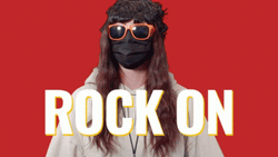 Rock On Gesture By A Masked Lady GIF | GIFDB.com