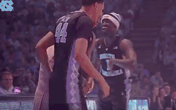 Roy Williams And His Team Sharing Joyful Moment GIF | GIFDB.com