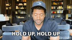 Russell Wilson Hold Up GIF | GIFDB.com