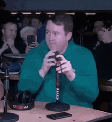 Shane Gillis Fixing Mic Side Eye GIF | GIFDB.com