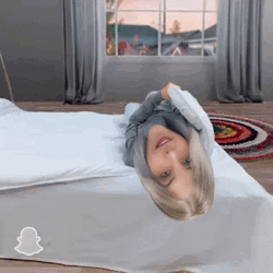 She Rolling On The Bed Before Nap Time GIF | GIFDB.com