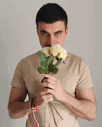 Simple Man Giving Flowers GIF | GIFDB.com