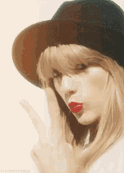 Singer Taylor Swift 2 Finger Sign GIF | GIFDB.com