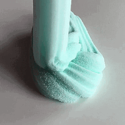 Pouring Cyan Slime Swirl GIF | GIFDB.com