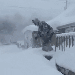 Funny Guy Diving In Snow Storm GIF | GIFDB.com