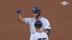 Stanton Talks To Teammate Points Head GIF | GIFDB.com