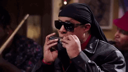 Stevie Wonder Playing Harmonica GIF | GIFDB.com
