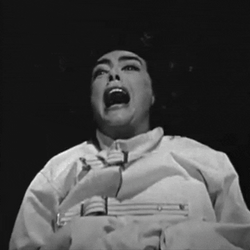 Straight Jacket Scared Lady Screaming GIF | GIFDB.com